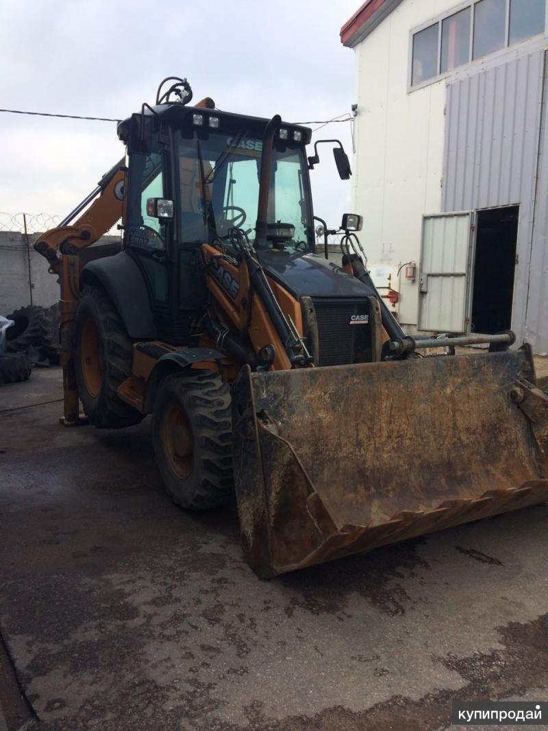 Экскаватор-погрузчик Case 580T в Москве
