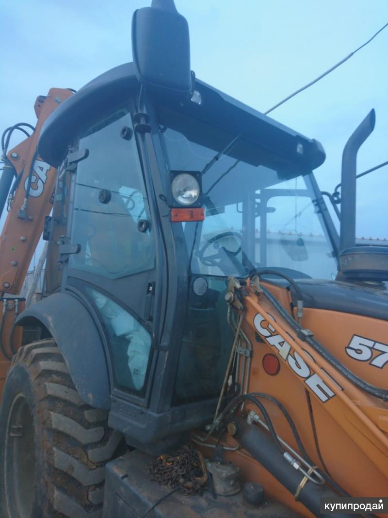 Продам экскаватор-погрузчик Case 570ST в Москве